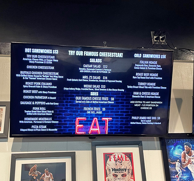 The illuminated menu board at Mr. Z's &ndash; a roadmap to happiness featuring their legendary cheesesteaks and pizza creations.