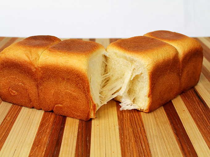 Vermont's answer to cloud nine: a perfectly baked milk bread loaf with a golden crust that crackles just right and an interior so fluffy it defies gravity.