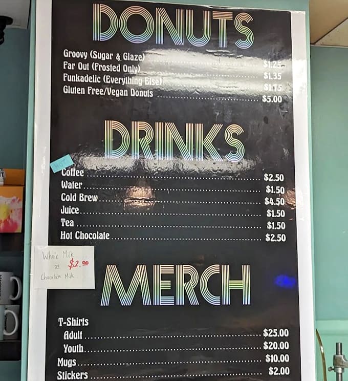 The menu board showcases whimsically named categories – Groovy, Far Out, and Funkadelic – promising a flavor adventure for every palate.