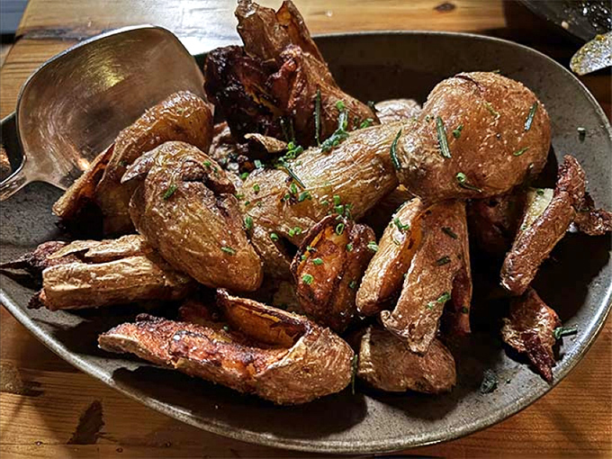 These aren't just potatoes &ndash; they're flavor bombs with crispy exteriors giving way to pillowy centers, each bite a testament to simple perfection.