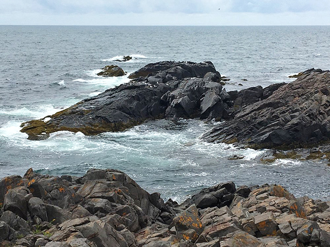The island's rocky coastline tells geological stories spanning millennia, where each wave adds another line to the never-ending tale.