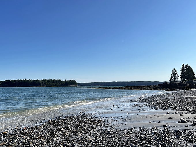 Pebbles and waves perform their ancient dance along this secluded shoreline, where the Atlantic whispers stories to patient listeners.
