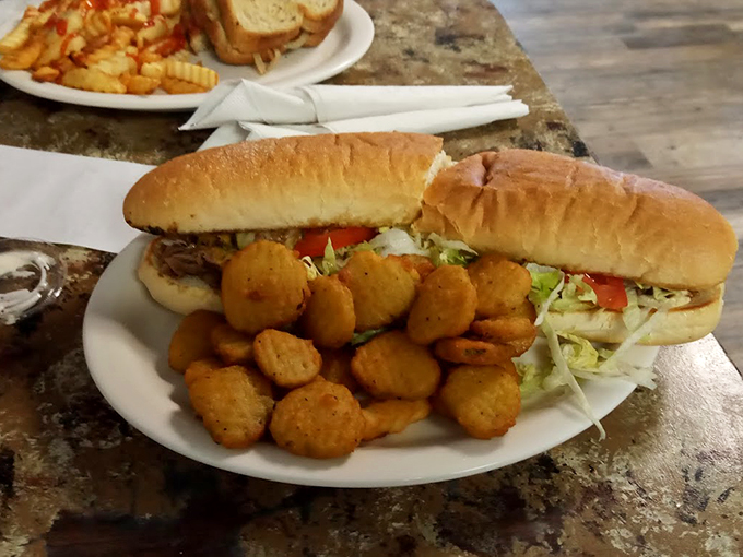 Behold, the sandwich of your dreams! Layers of flavor stacked so high, you might need a ladder to tackle it.