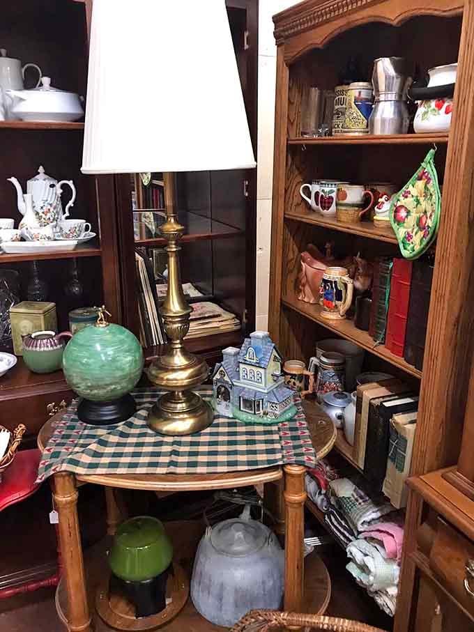 Shelves overflow with ceramic treasures and vintage finds, creating a visual feast that would make Marie Kondo question everything.