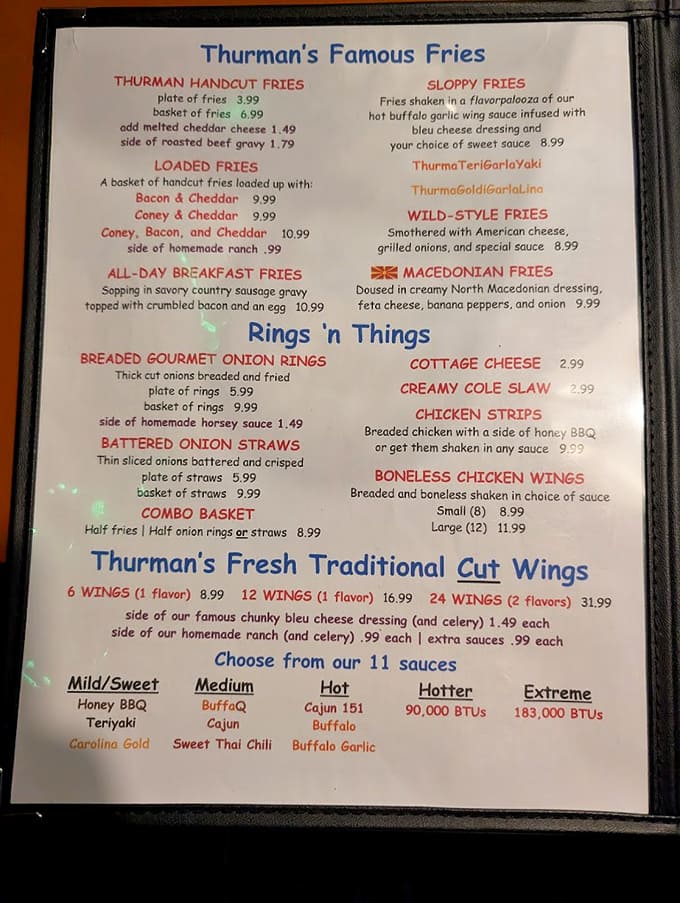 This menu doesn't mess around with portion sizes, offering everything from breakfast fries to wings that'll test your heat tolerance.