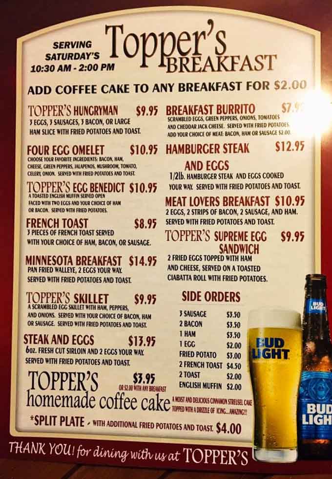 The breakfast menu offers hearty options including the Hungryman, Meat Lovers Breakfast, and that intriguing homemade coffee cake add-on.