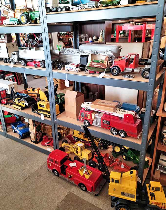 Vintage trucks and tractors await young-at-heart collectors, each toy telling stories of Christmas mornings and childhood adventures from decades past.