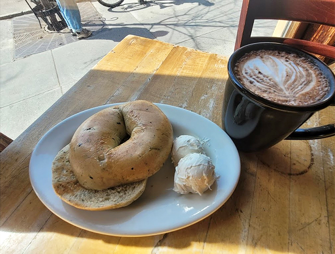 Behold, the holy grail of breakfast! This bagel's got more curves than a country road and a schmear that's smoother than a jazz saxophone.