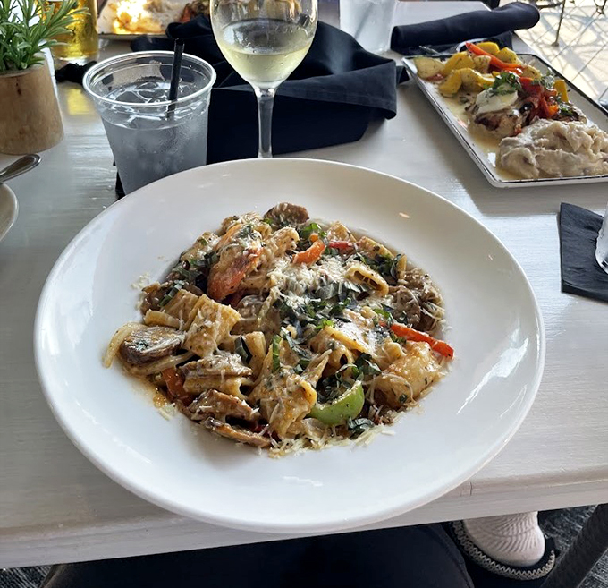 A pasta party in a bowl! This Cajun Alfredo is like a spicy hug for your taste buds—comfort food with a kick that will make you say "Oh my!"