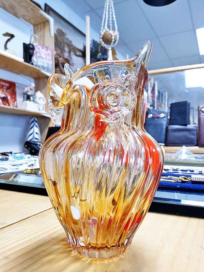This hand-blown glass owl isn't just watching you shop, it's judging your taste in vintage glassware with those knowing eyes.