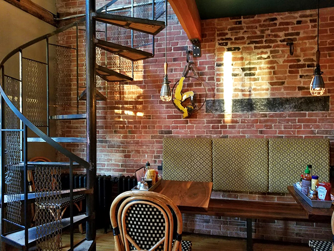 Industrial chic meets cozy nook. Is that a banana-shaped sculpture? Talk about a-peeling decor!