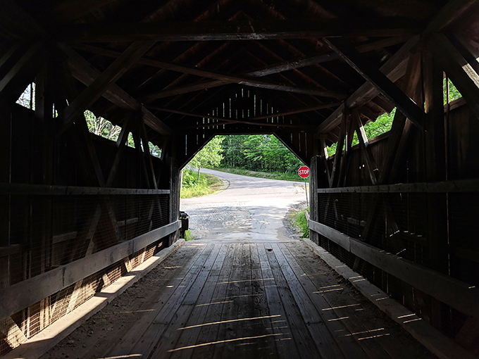 Peering through the wooden skeleton of the bridge reveals an almost cathedral-like interior where footsteps echo whether anyone's walking or not.