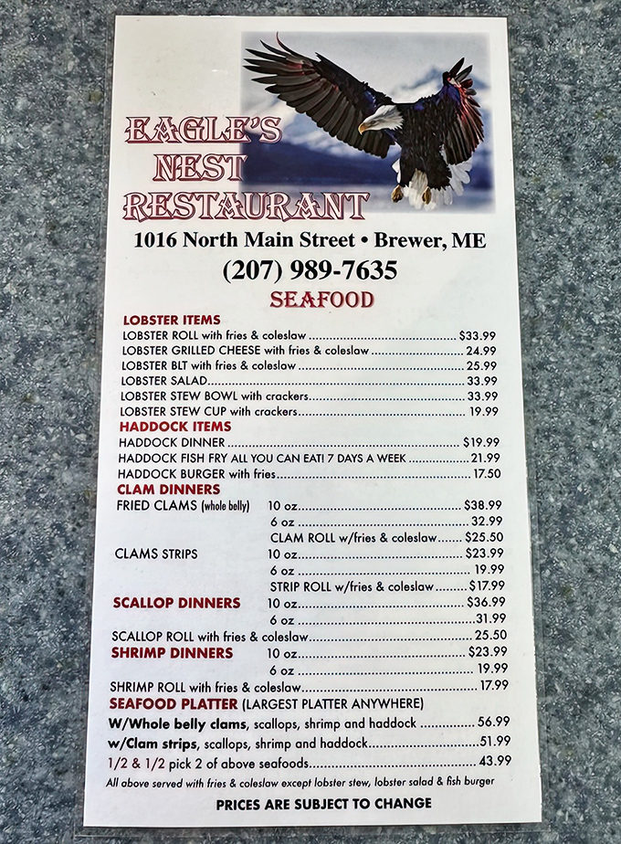 The menu board showcases Maine's finest offerings &ndash; lobster in various forms, fresh haddock, and classic seafood combinations.