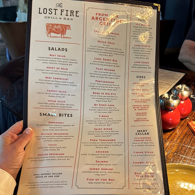 The menu reads like a carnivore's dream, with the filet mignon taking center stage among an impressive lineup of wood-fired specialties.