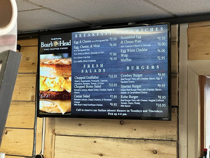The menu board showcases Boar's Head deli offerings from breakfast sandwiches to burgers, each promising a flavor adventure worth writing home about.