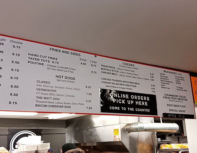 Decisions, decisions! The menu board tempts with classics like hand-cut fries and creative hot dog options, but we all know why you're really here.