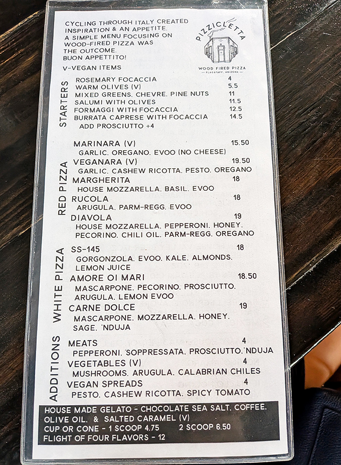 The concise menu tells a story of Italian inspiration, featuring authentic Neapolitan pizzas and carefully selected starters that transport you straight to Italy.