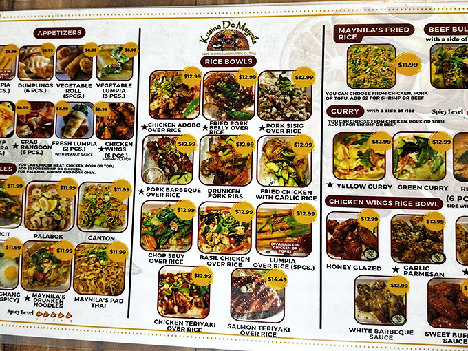 Decision paralysis has never been so delicious! The photo menu showcases Filipino classics from adobo to lumpia, with the legendary crispy pork belly front and center.