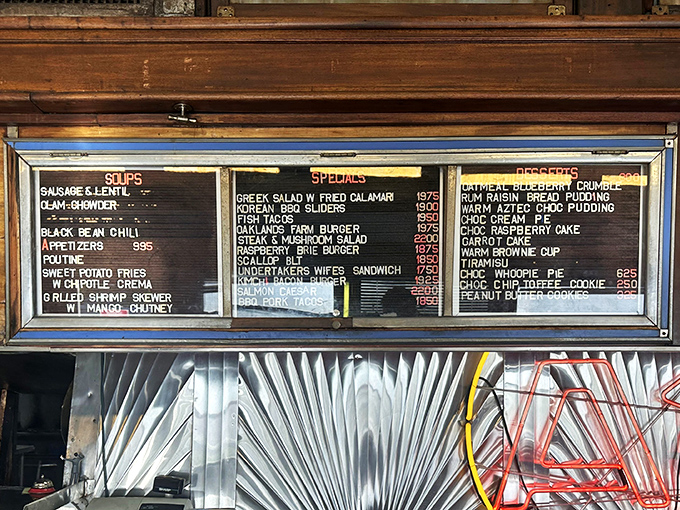 The menu board tells stories of comfort classics and unexpected treasures, from clam chowder to the mysterious "Undertaker's Wife" sandwich.