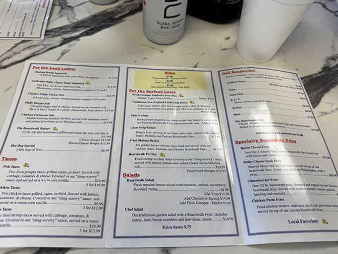 The menu reads like a love letter to seafood lovers, with that legendary lobster roll holding court among worthy contenders.
