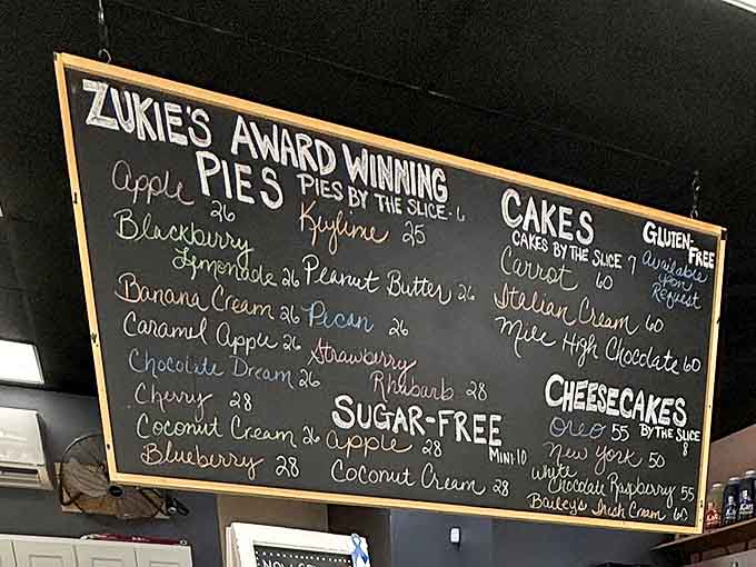 The chalkboard menu reads like poetry for dessert enthusiasts &ndash; a tempting lineup of pies, cakes, and cheesecakes that makes choosing just one nearly impossible.