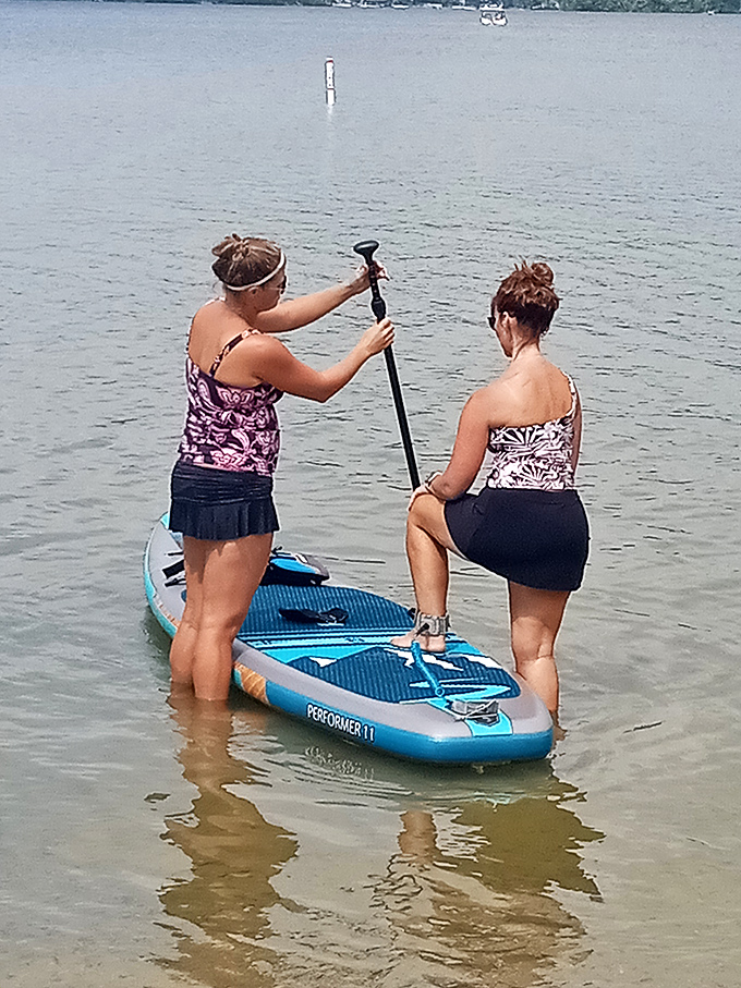 Paddleboarding adventures await! These ladies are discovering Lake Dunmore one stroke at a time.