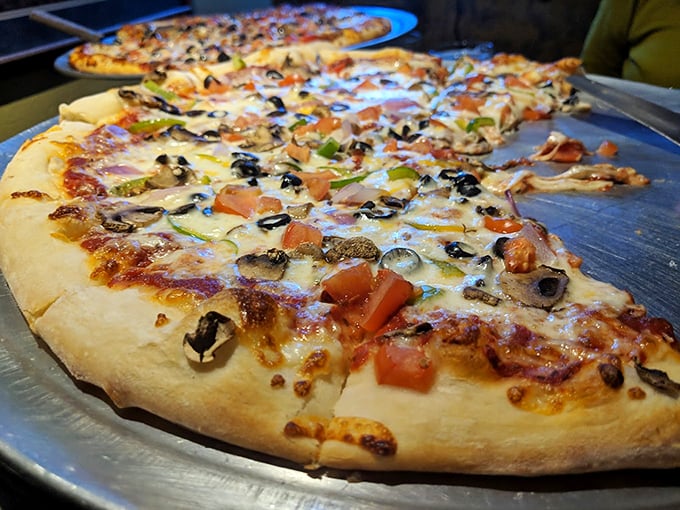 Behold, the pizza that puts the "oh!" in Route 66. This cheesy, veggie-laden disc isn't just a meal, it's a edible road trip across flavor country.