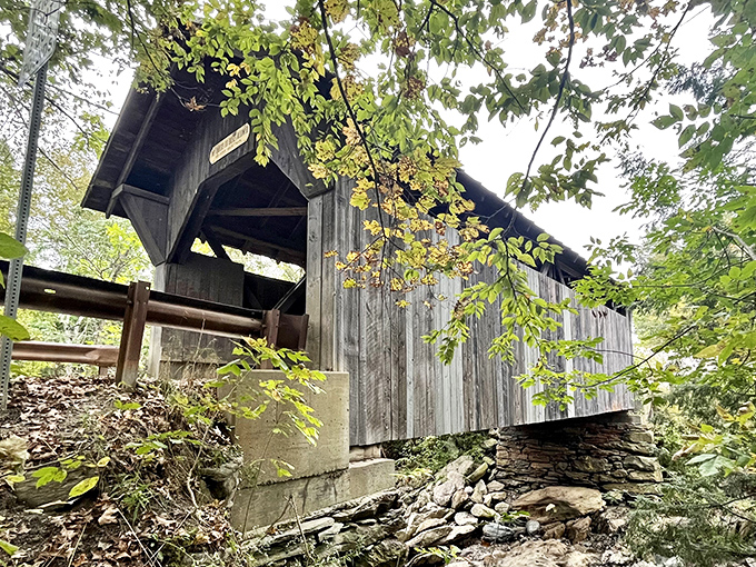 Weathered timbers tell silent stories of nearly two centuries of crossings, both ordinary and perhaps supernatural.