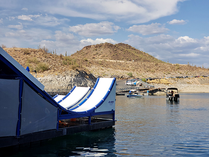 The slide's gentle curve belies the heart-pounding descent awaiting brave souls who dare to climb those steps.