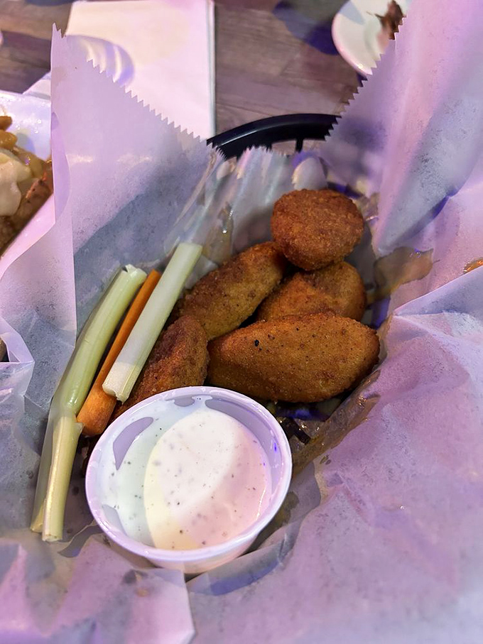 Who needs chicken when these vegetarian "wings" deliver all the satisfaction? Crispy, flavorful nuggets served with cooling veggies and creamy dipping sauce.