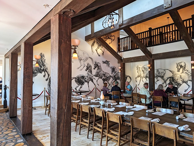 Giddy up, art lovers! This dining room's wild horse mural is giving major "Spirit: Stallion of the Cimarron" vibes. Neigh-ver seen anything like it!