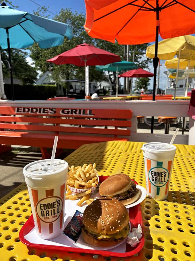 Colorful umbrellas, classic burgers, and lakeside views. It's like a Norman Rockwell painting you can eat at!