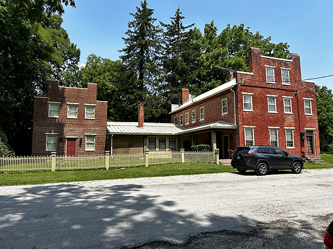 These brick buildings near the mill offer a glimpse into Clifton's rich architectural heritage, standing as silent witnesses to centuries of local history.