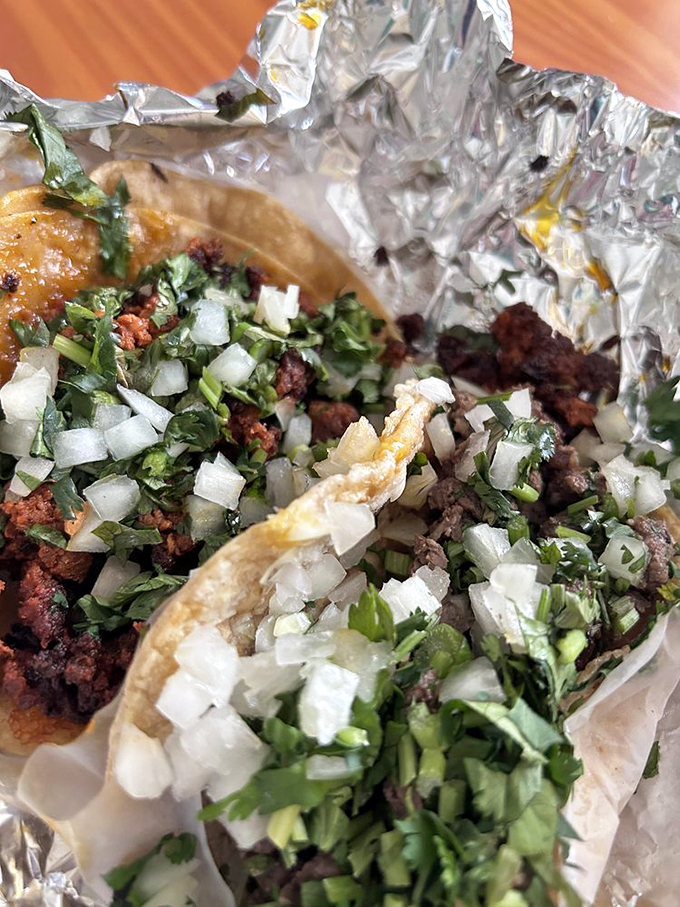 Taco with Chorizo A close-up that could make anyone's mouth water&mdash;charred edges, bright lime wedges, and that perfect meat-to-tortilla ratio.