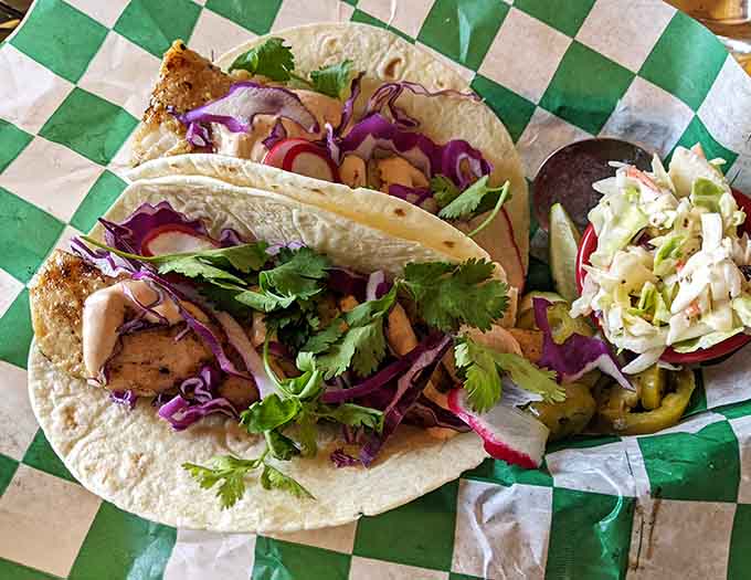 Fresh fish nestled in soft tortillas with vibrant toppings, these tacos have earned their cult following one delicious bite at a time.