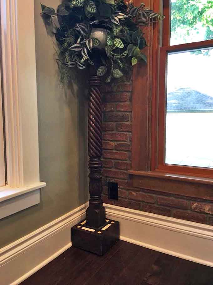 This ornate plant stand proves that Victorians never met a decorative flourish they didn't want to add, bless their maximalist hearts.