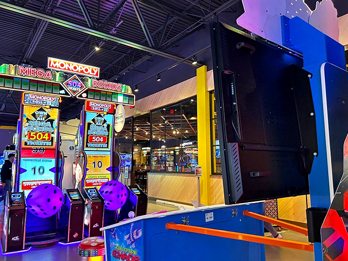 Jackpot junction! This Monopoly-themed game corner is where dreams of Park Place and Boardwalk come to life in technicolor glory.