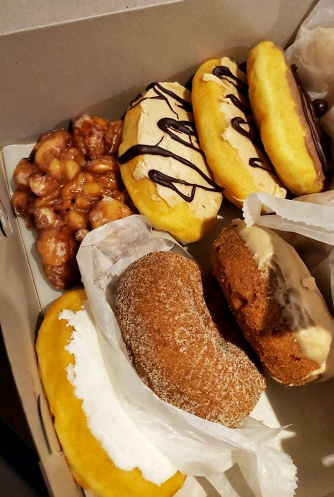 A box of heaven awaits – glazed beauties, apple fritters, and cinnamon-sugar delights that make you question why you ever settled for lesser donuts.