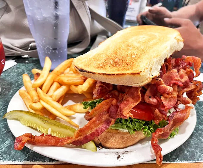 This isn't just a BLT&mdash;it's a skyscraper of crispy bacon that requires engineering skills to eat and provides enough protein for a small village.