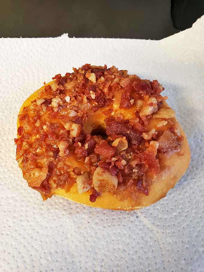 Bacon Donut: Breakfast's greatest hits album on a donut &ndash; sweet maple glaze meets salty bacon bits in perfect harmony.