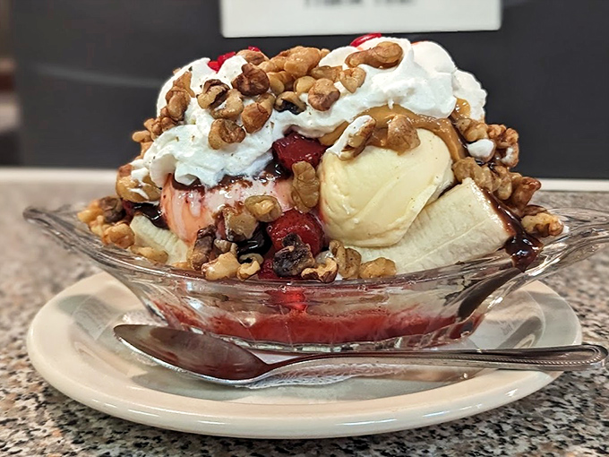 This banana split isn't just dessert, it's architecture &ndash; a masterpiece of fruit, ice cream, and toppings that demands to be photographed before devoured.