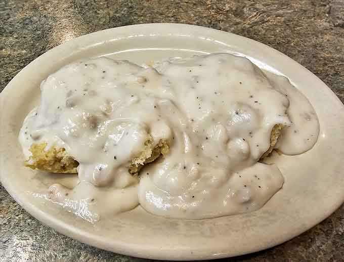 Behold the legendary biscuits and gravy that have people driving from Phoenix before sunrise, and yes, they taste even better than they look.