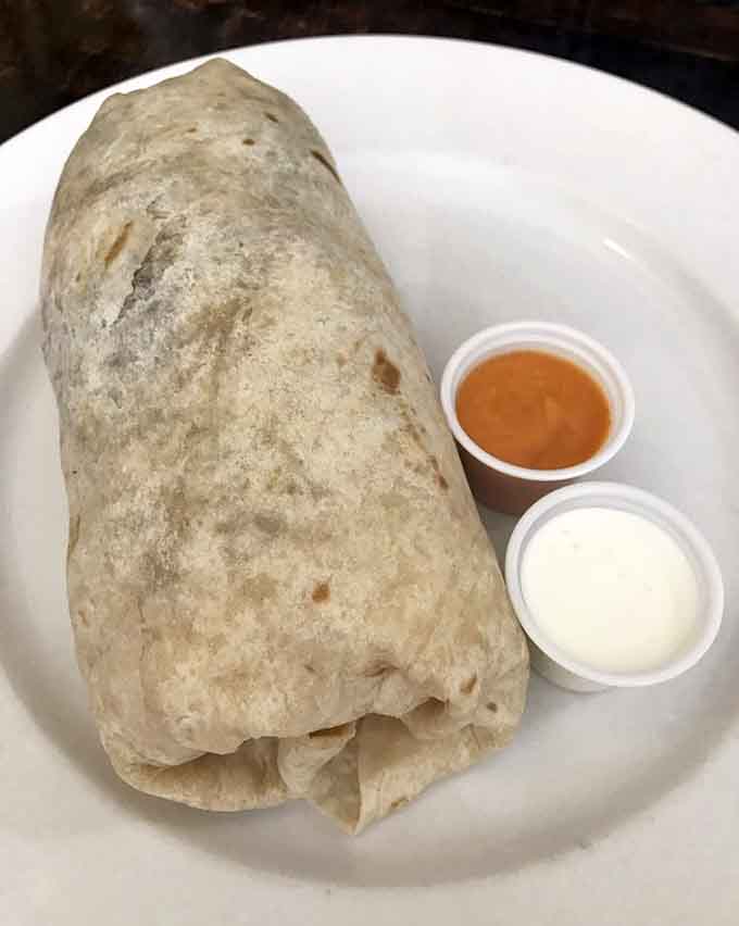 Behold the beast in its natural habitat, wrapped tight and ready to challenge your appetite and your assumptions.