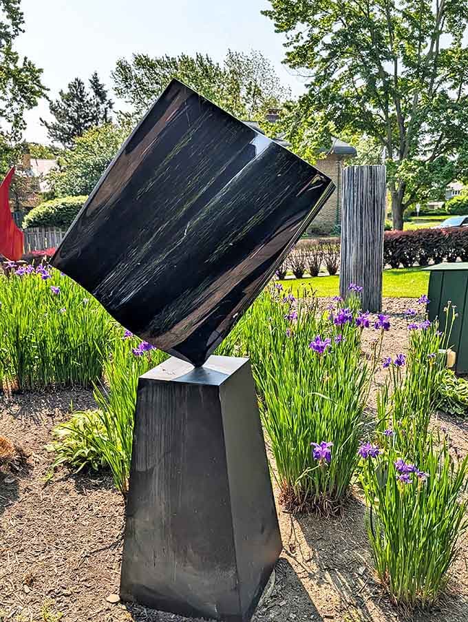 This commanding black monolith balances precariously, defying gravity while inviting contemplation about stability and impermanence.