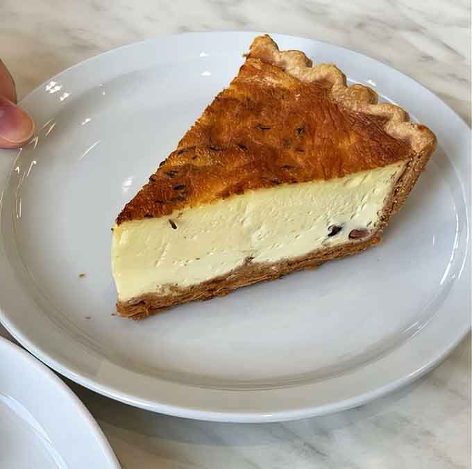 That golden top and creamy interior are what quiche dreams are made of, no sad buffet versions allowed here.