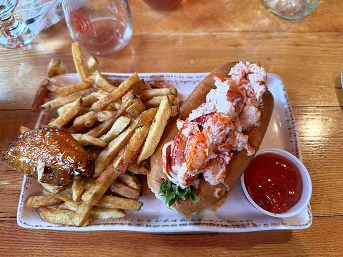 Behold the star of the show: a generously stuffed lobster roll paired with crispy fries that'll make your taste buds sing.