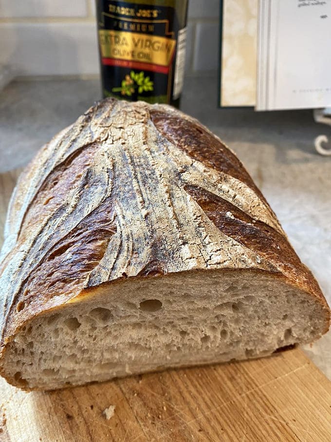 This crusty artisan loaf showcases the bakery's commitment to traditional bread-making techniques that produce superior texture and flavor.