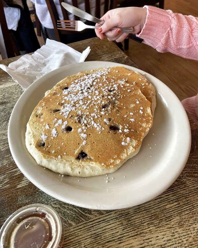 These blueberry pancakes aren't just breakfast &ndash; they're edible clouds dotted with bursts of fruity joy. Powdered sugar snow optional!