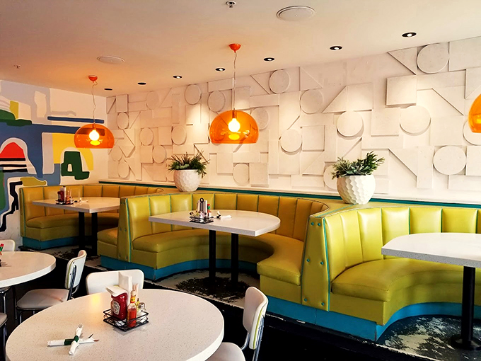Slide into these booths and let the good times roll! It's like a 60s diner got a modern art makeover.
