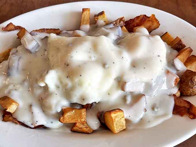 Behold the breakfast horseshoe: fries, gravy, and enough comfort to fuel your entire day, possibly your entire week.